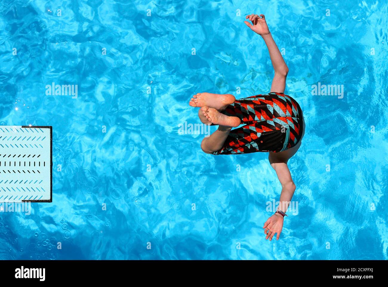 Boy On Diving Platform High Resolution Stock Photography and Images - Alamy