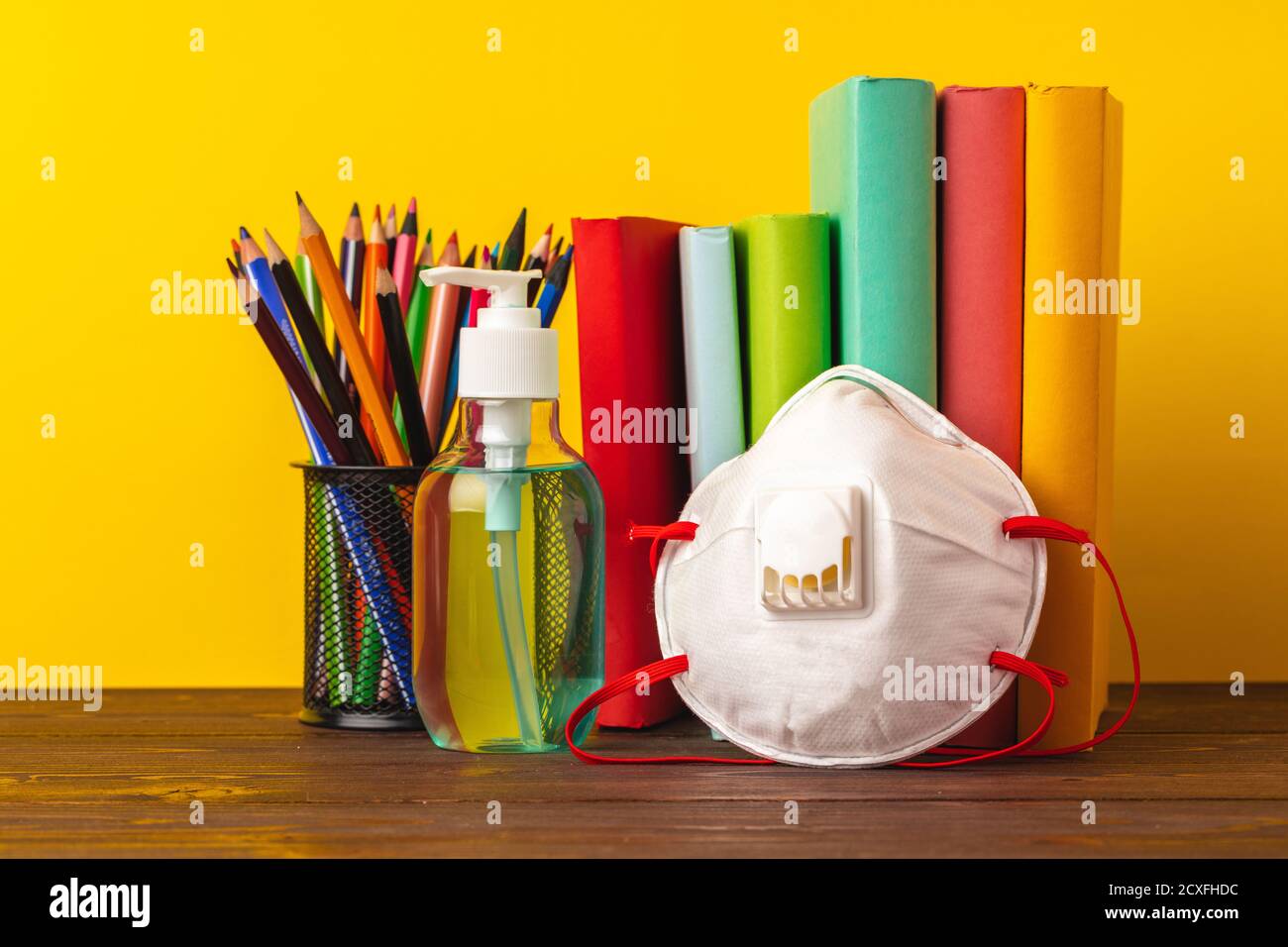 School supplies and medical face mask, front view Stock Photo - Alamy