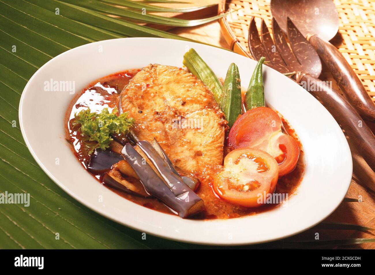Assam fish, a Minangkabau and Malay sour and spicy fish stew dish Stock ...
