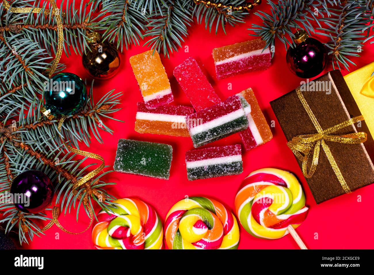 Leneds on a stick and marmalade on a red background. Banner for ...
