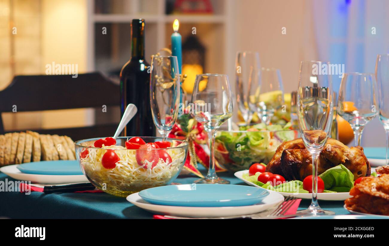 Traditional food for christmas celebration of friends. Candles on the ...