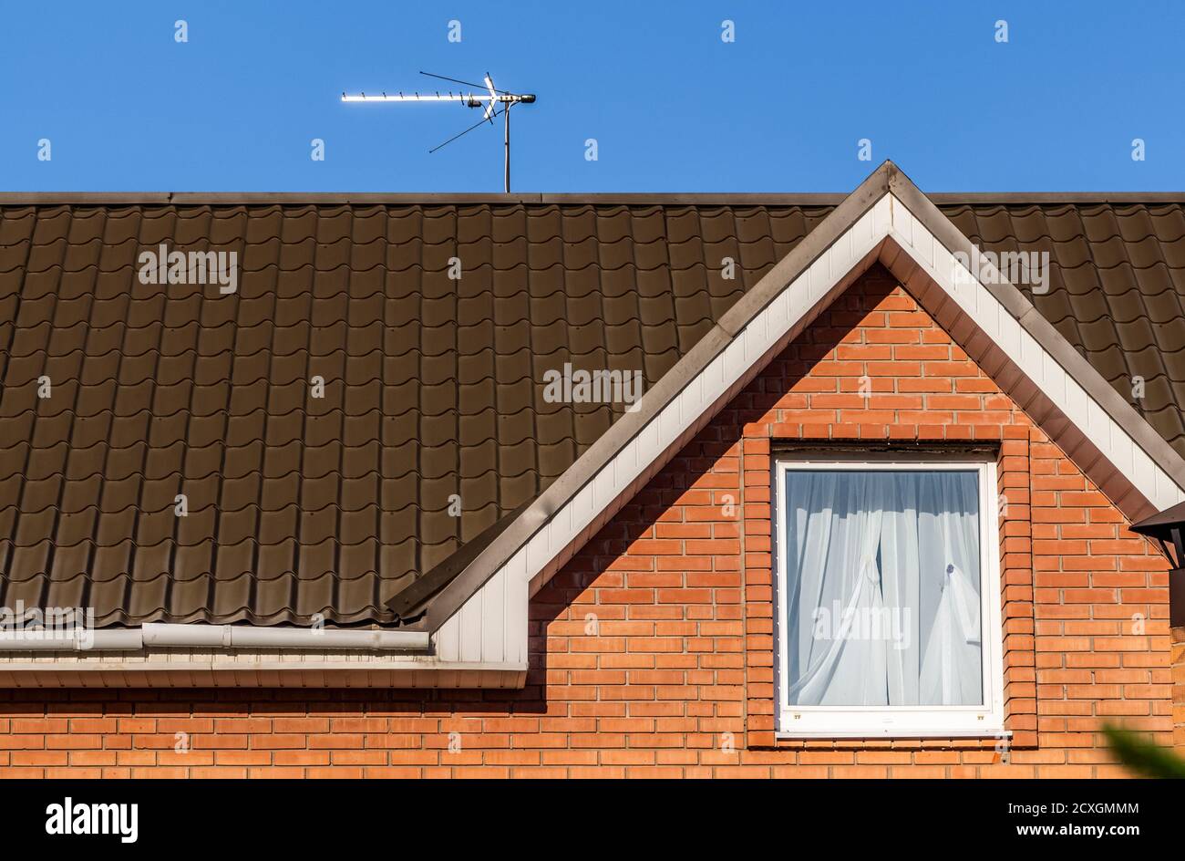The upper part of the house. Roof, inspection windows, chimney Stock ...