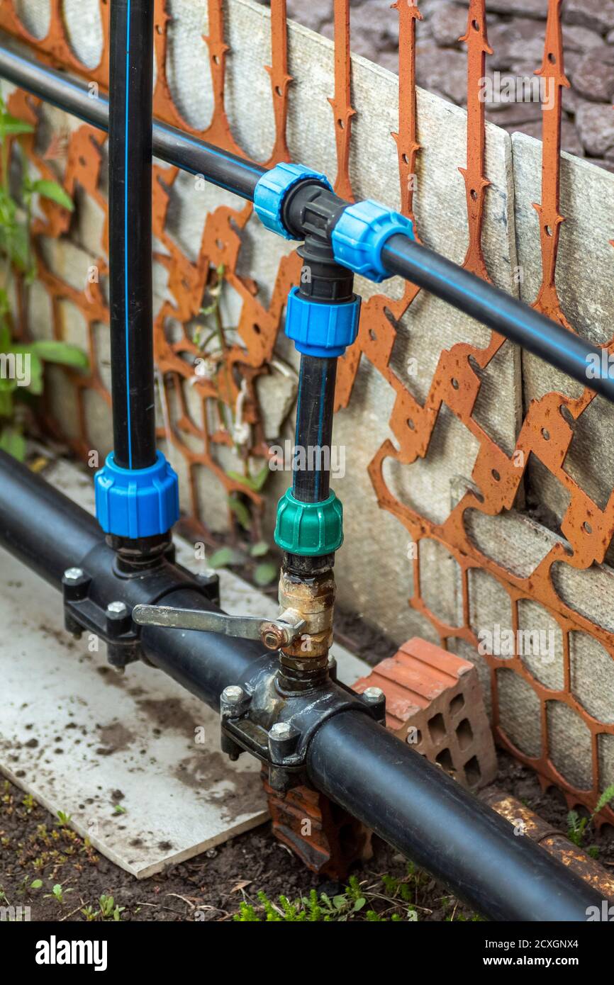 The main valve of the irrigation system in the backyard of a private ...