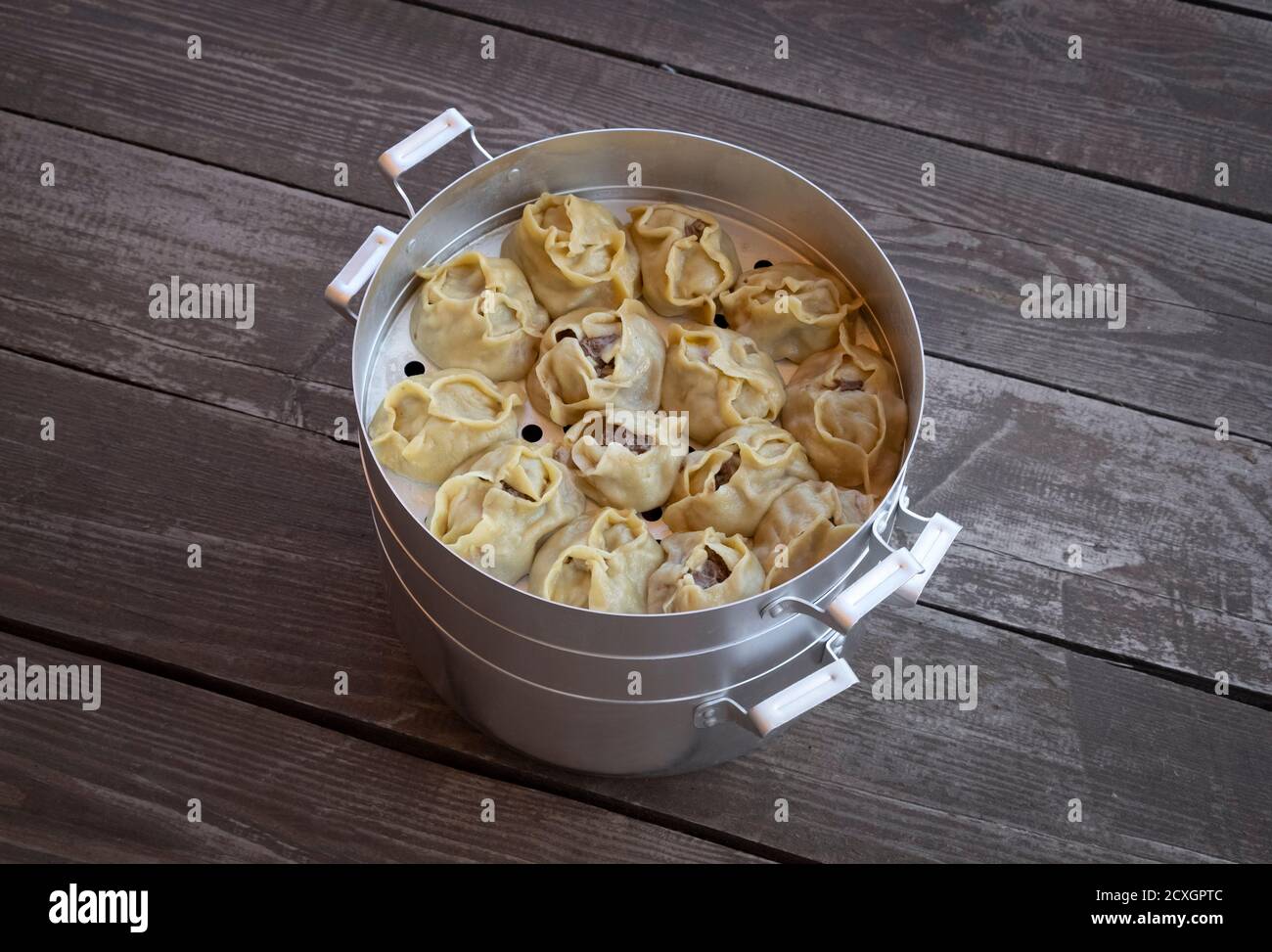 Ready-made hot manti in an aluminum cooker Stock Photo - Alamy
