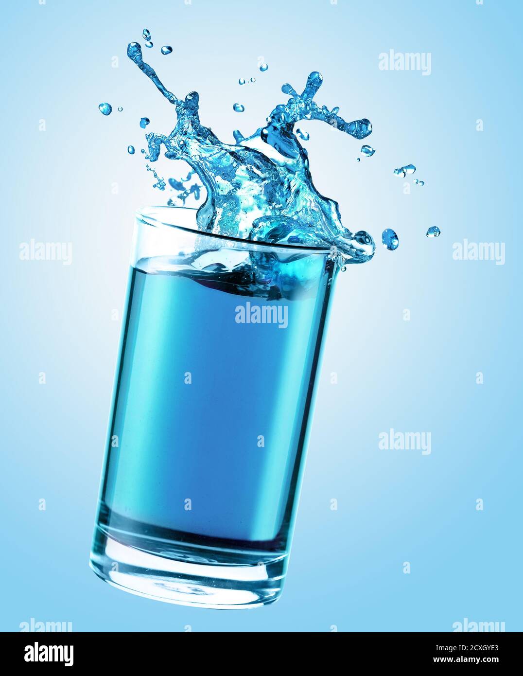 Water splash coming out from glass Stock Photo - Alamy