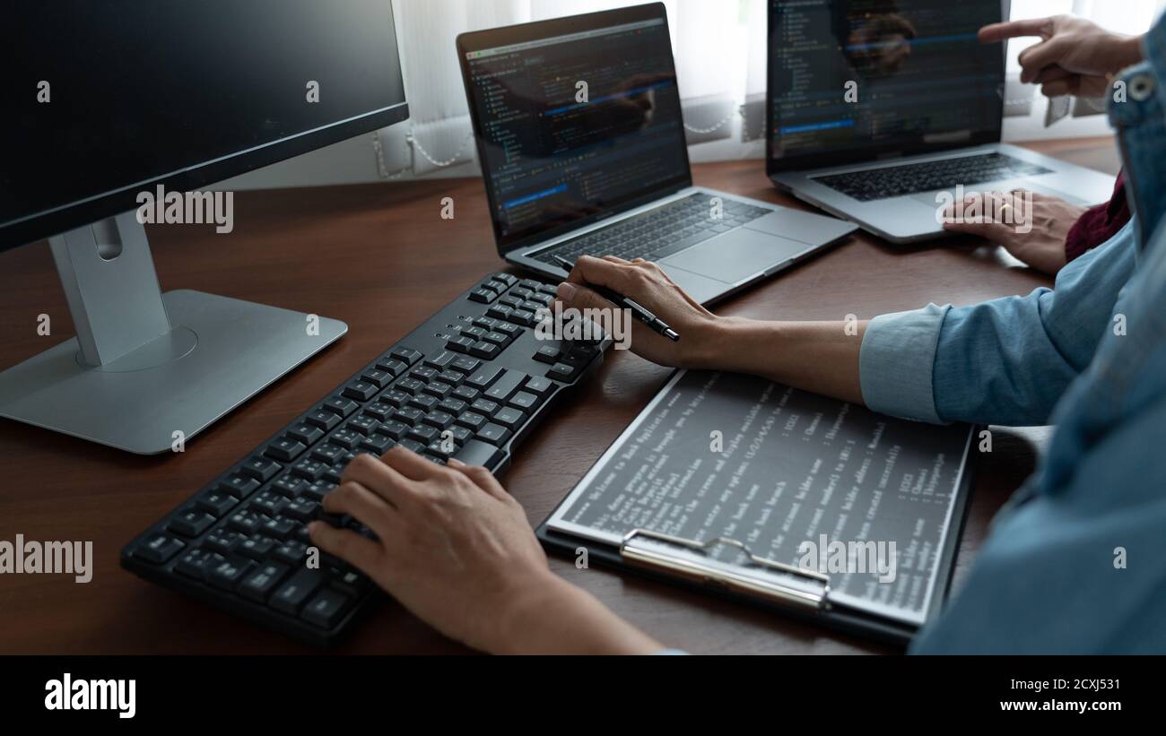 Developing programmer team hi-res stock photography and images - Alamy