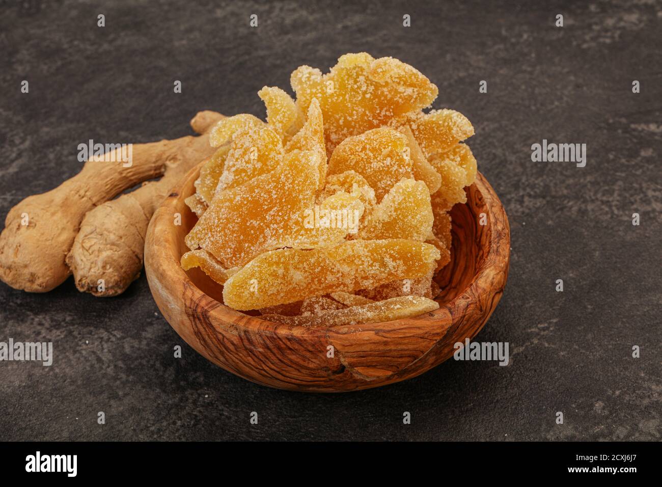 Dry sweet ginger snack in the bowl Stock Photo - Alamy