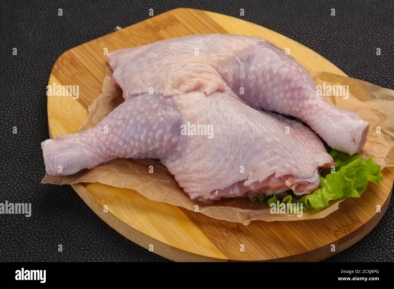 Raw chicken leg ready for cooking Stock Photo - Alamy