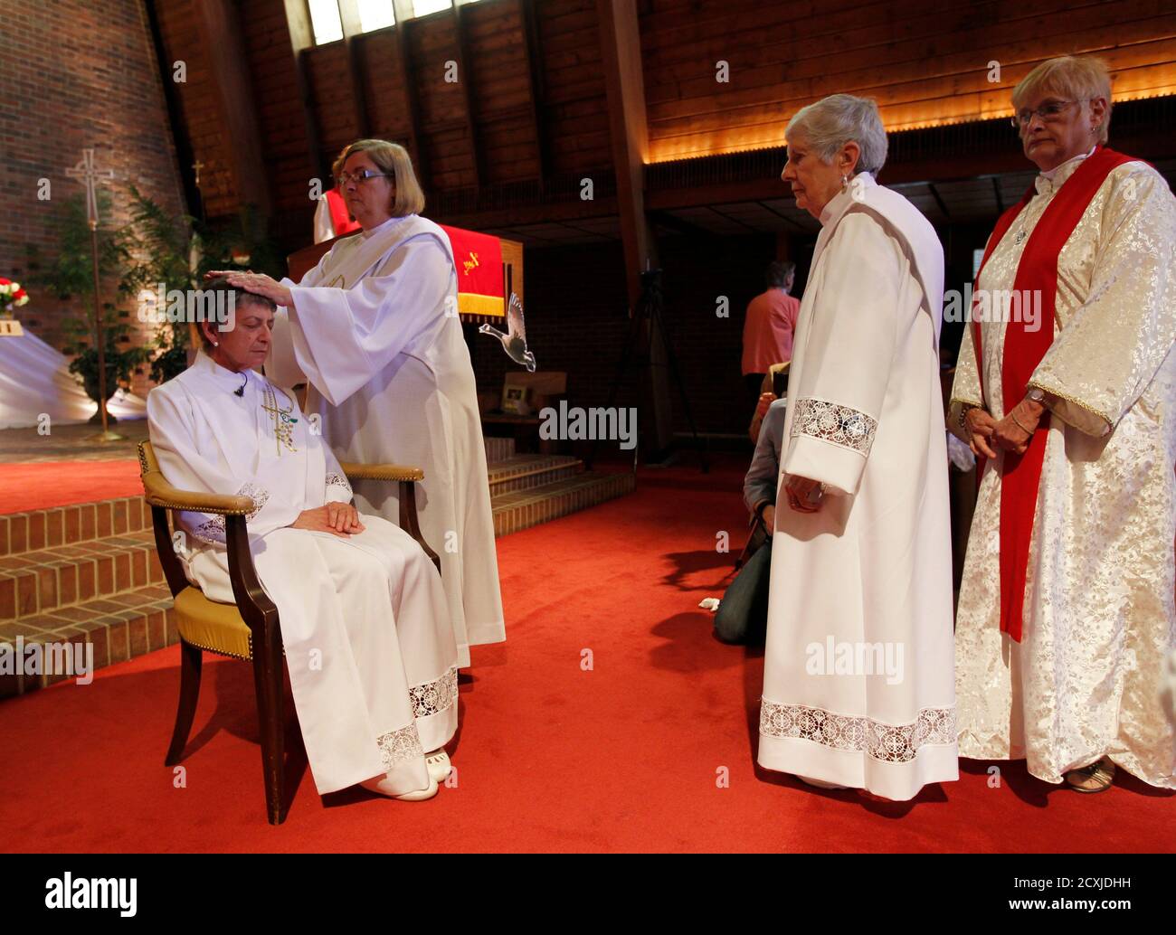 Ordination of a catholic priest hi-res stock photography and images - Alamy