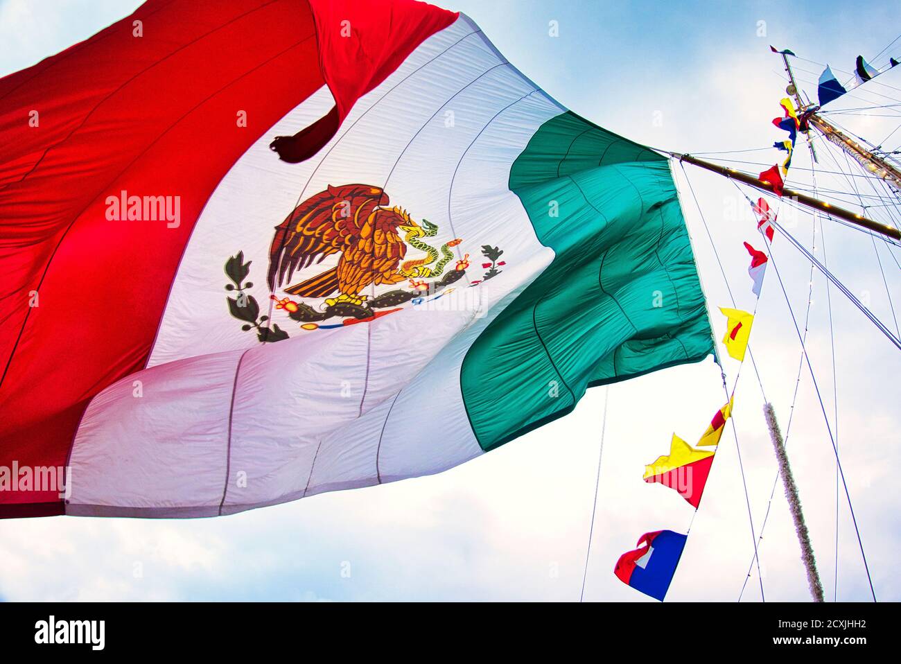 Flag of Mexico in the wind against the blue sky, at Rouen, Armada ...