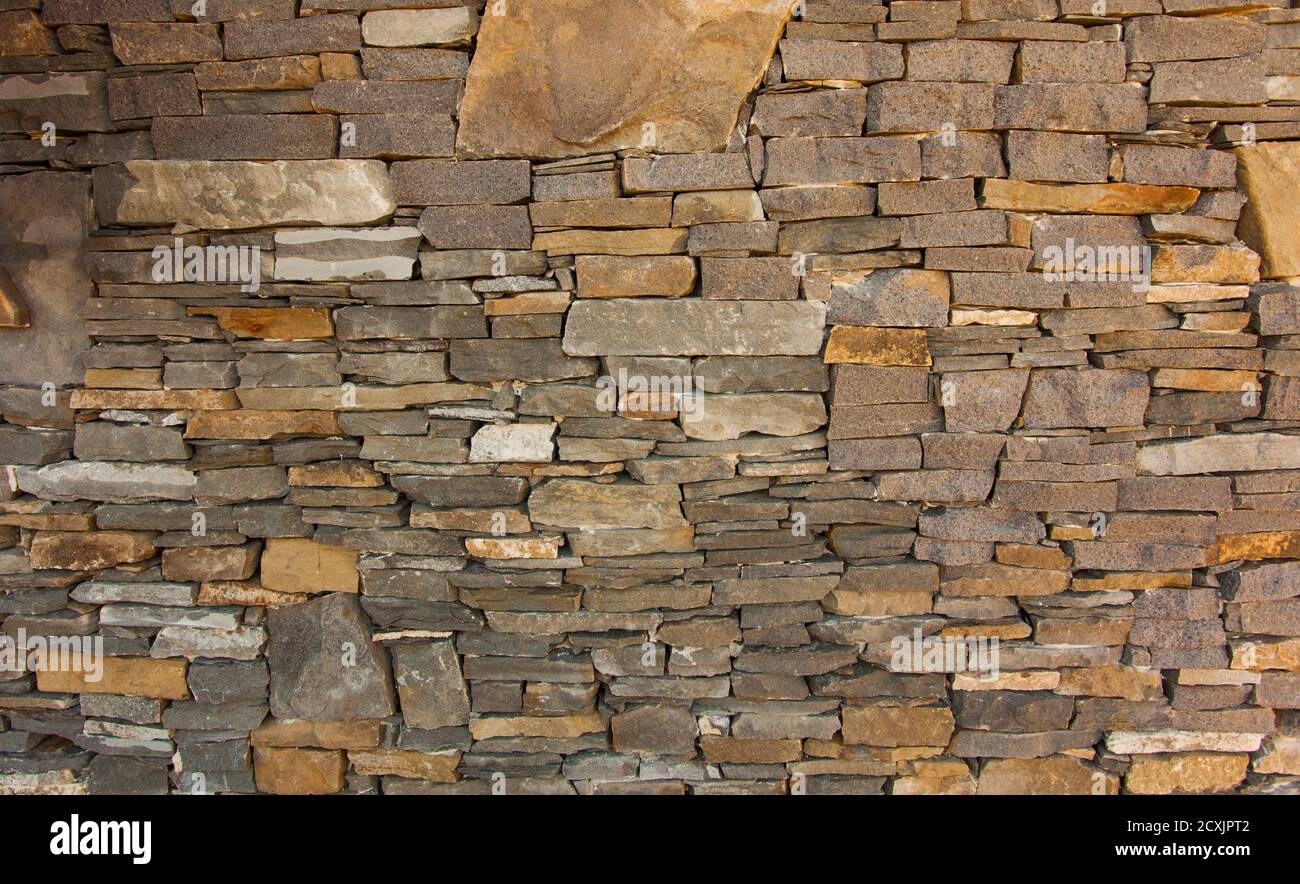 natural stone wall texture and background Stock Photo - Alamy