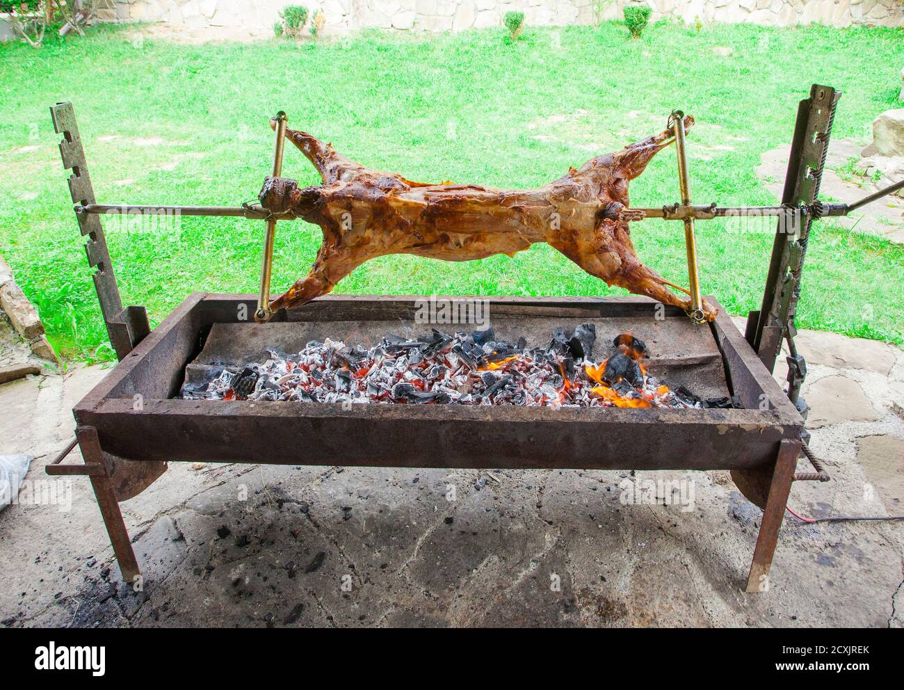 whole lamb or sheep on the barbecue Stock Photo - Alamy