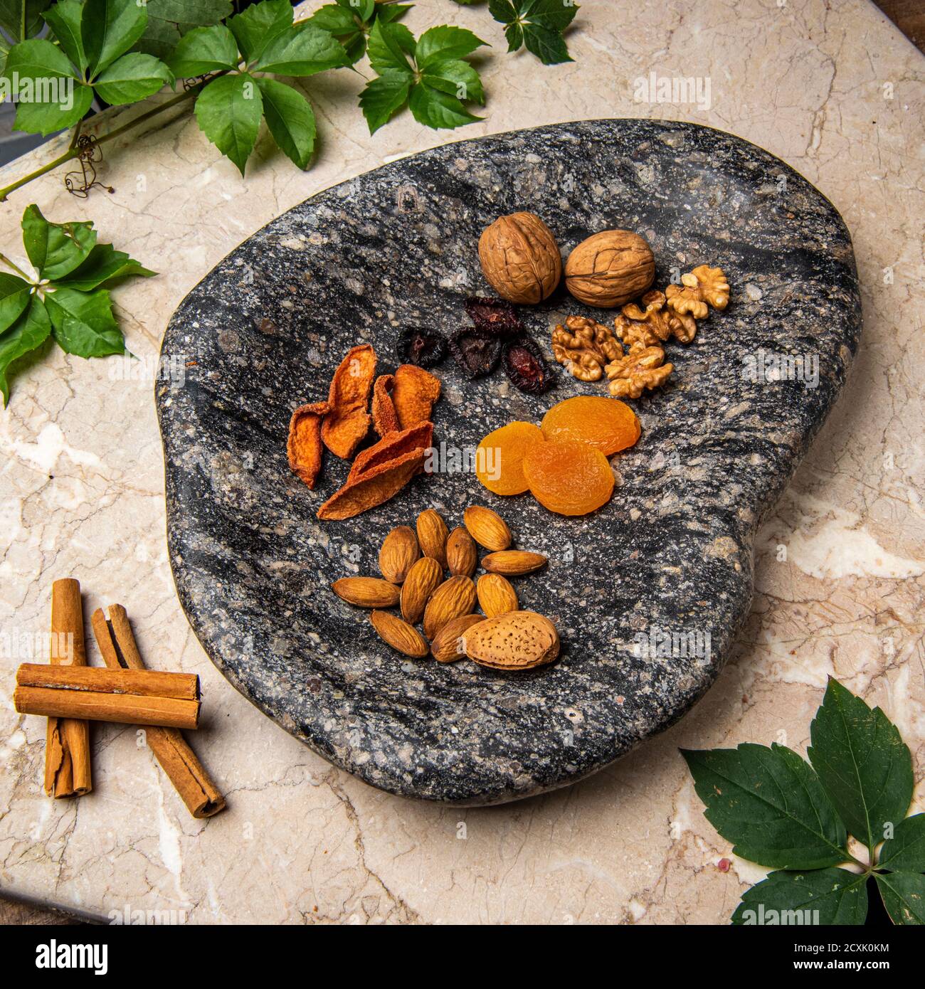 natural stone bowl handcrafted with spices Stock Photo - Alamy