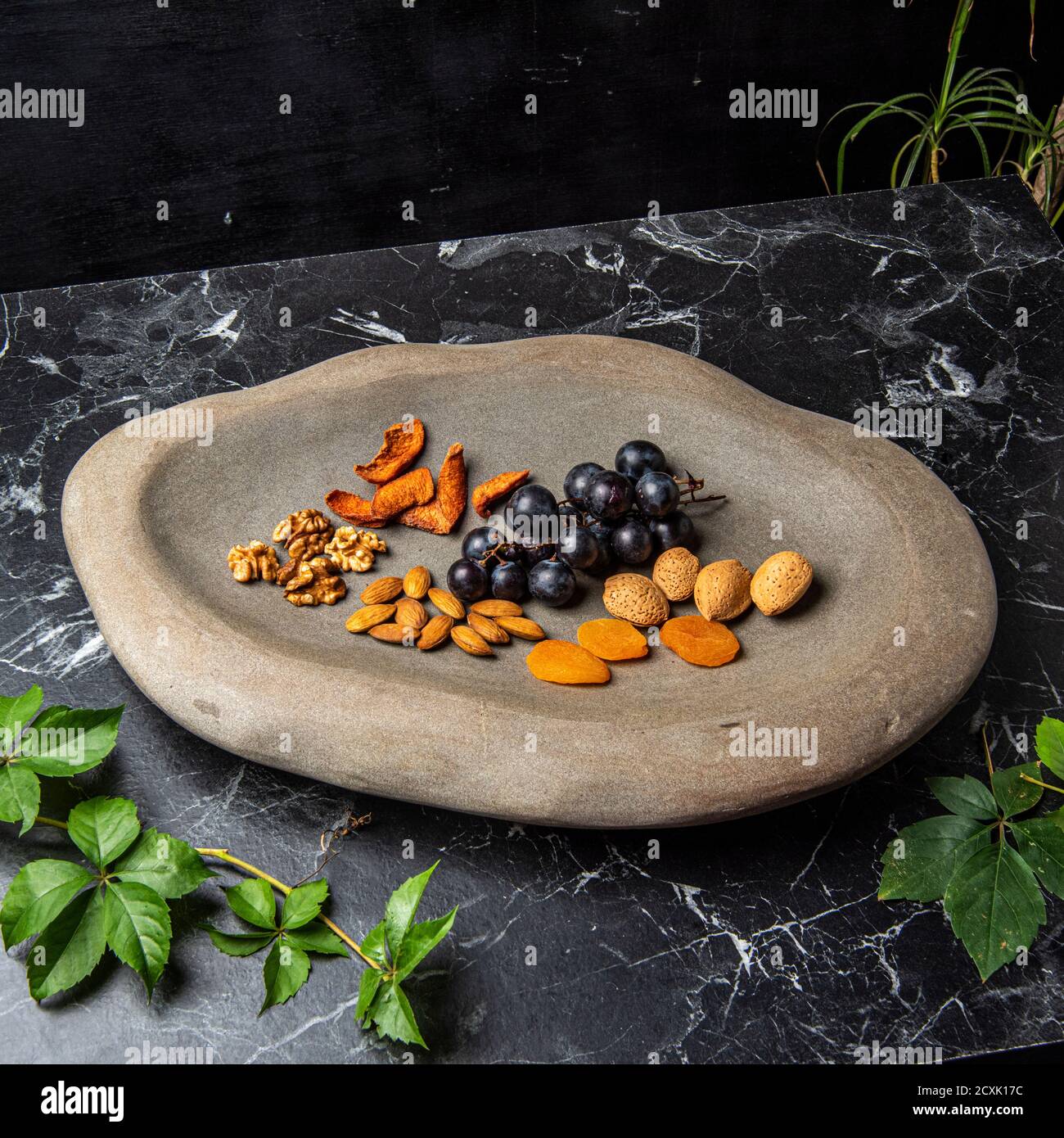 natural stone bowl handcrafted with spices Stock Photo - Alamy