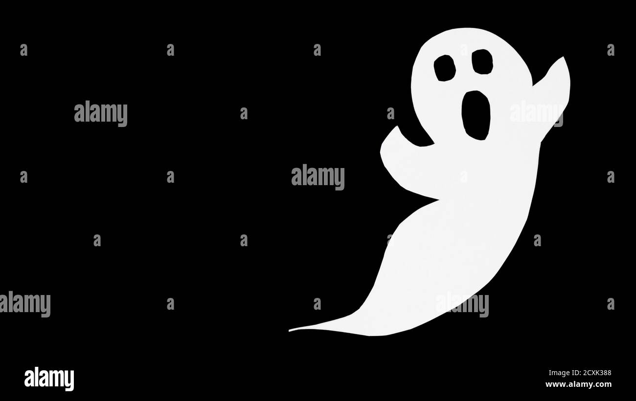 Cut out paper ghost on black. Halloween background decor holiday ...
