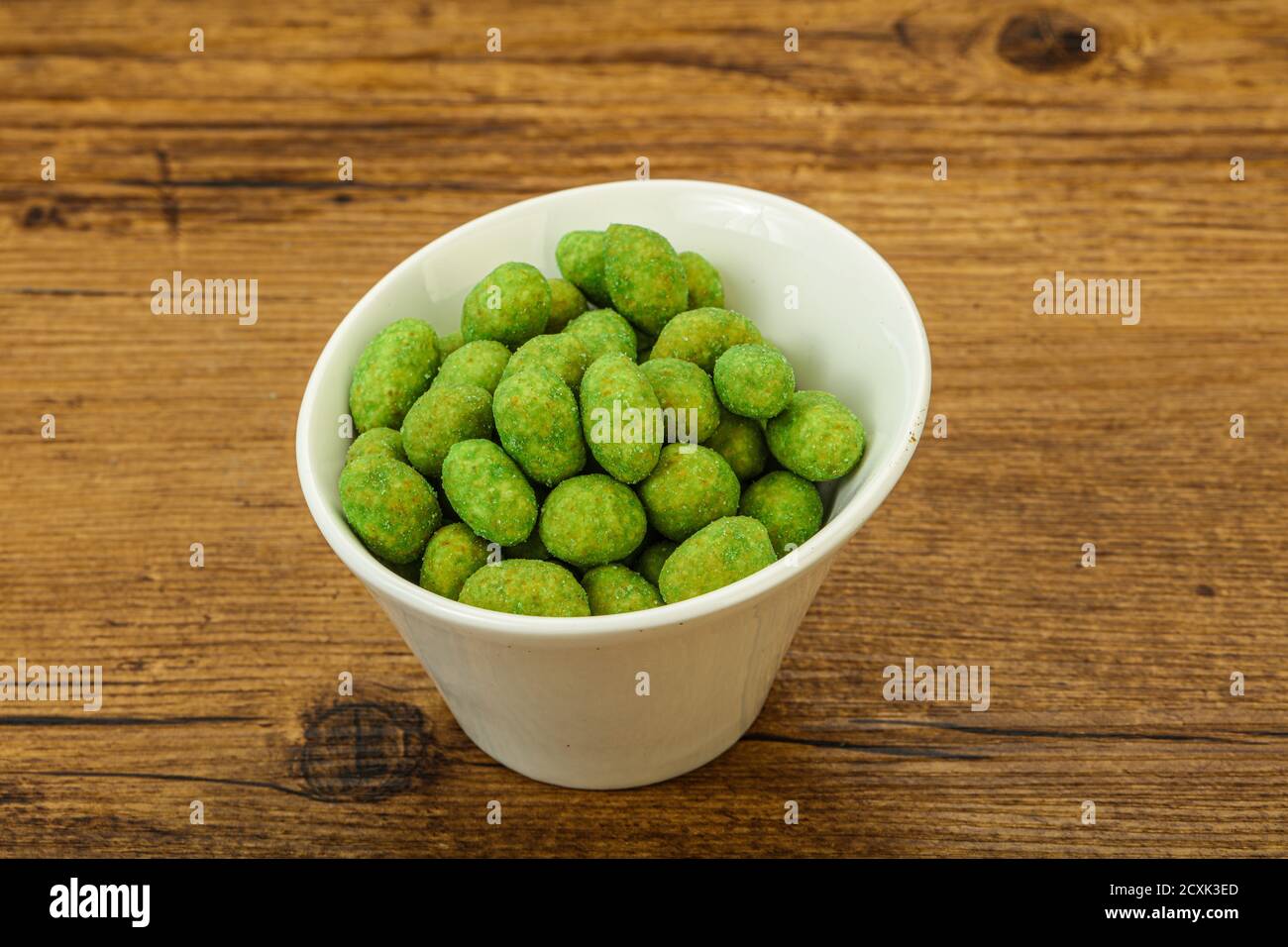 Spicy wasabi peanuts snack in the bowl Stock Photo - Alamy