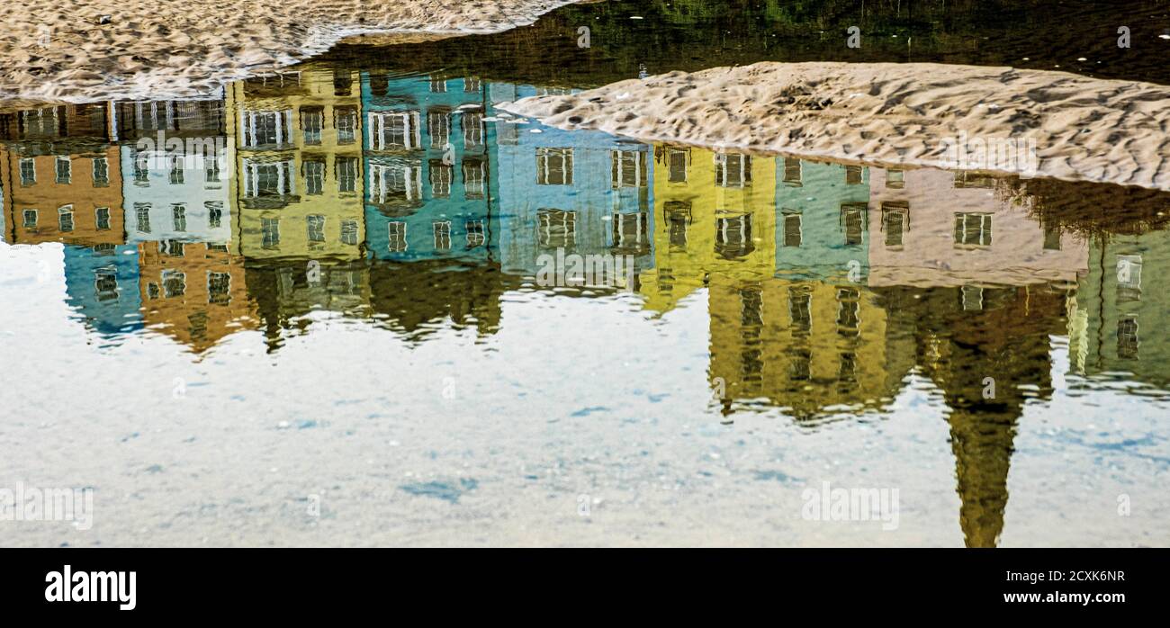Tenby, West Wales reflected in a pool of water Stock Photo - Alamy