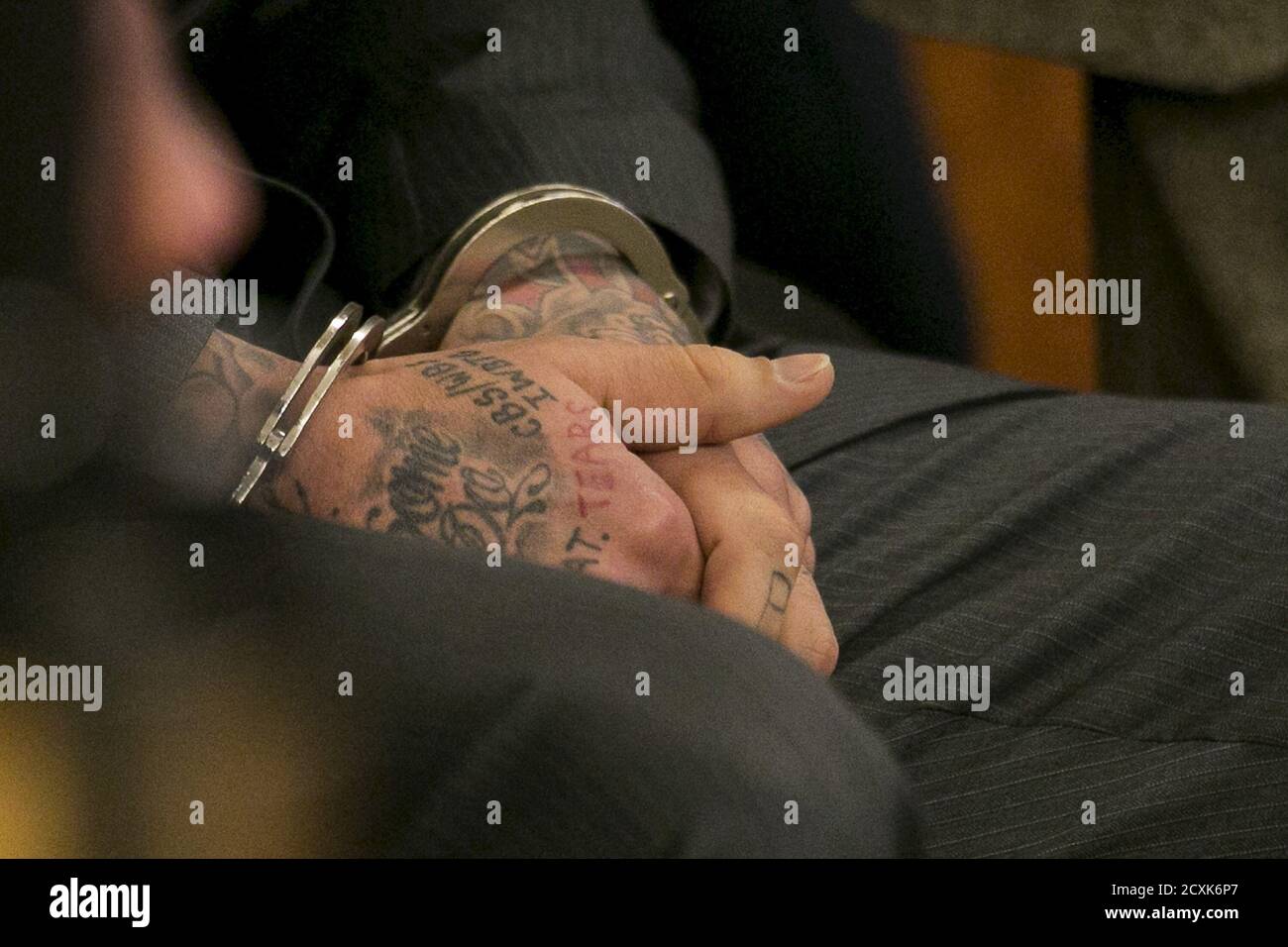 Court handcuffs england hi-res stock photography and images - Alamy