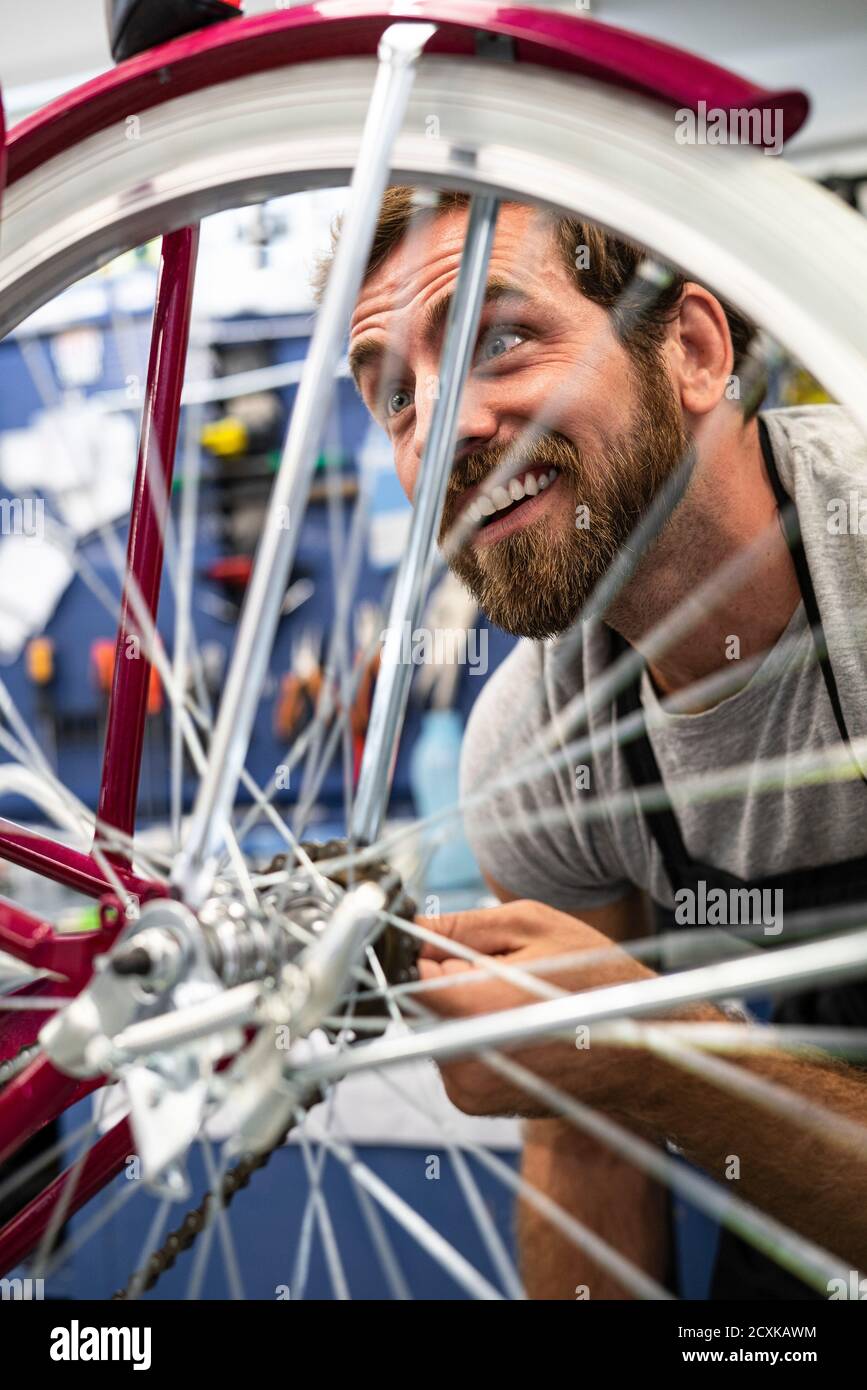 Repairing bicycle wheel hi-res stock photography and images - Alamy