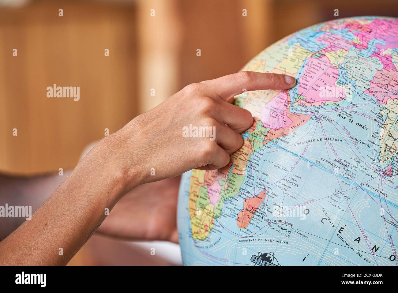 Close up pointing on world globe hi-res stock photography and images ...
