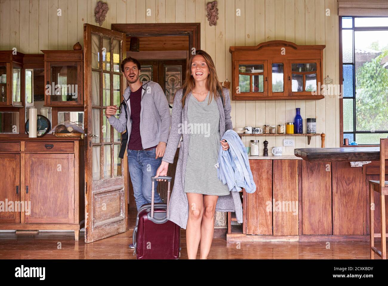Young couple entering their new house Stock Photo - Alamy
