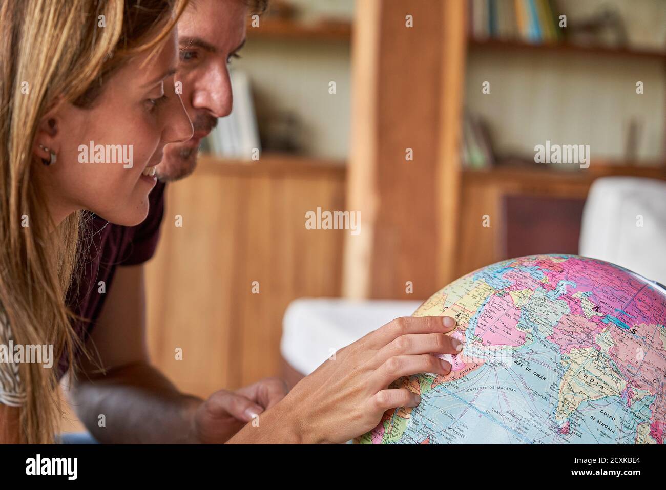 Close up pointing on world globe hi-res stock photography and images ...