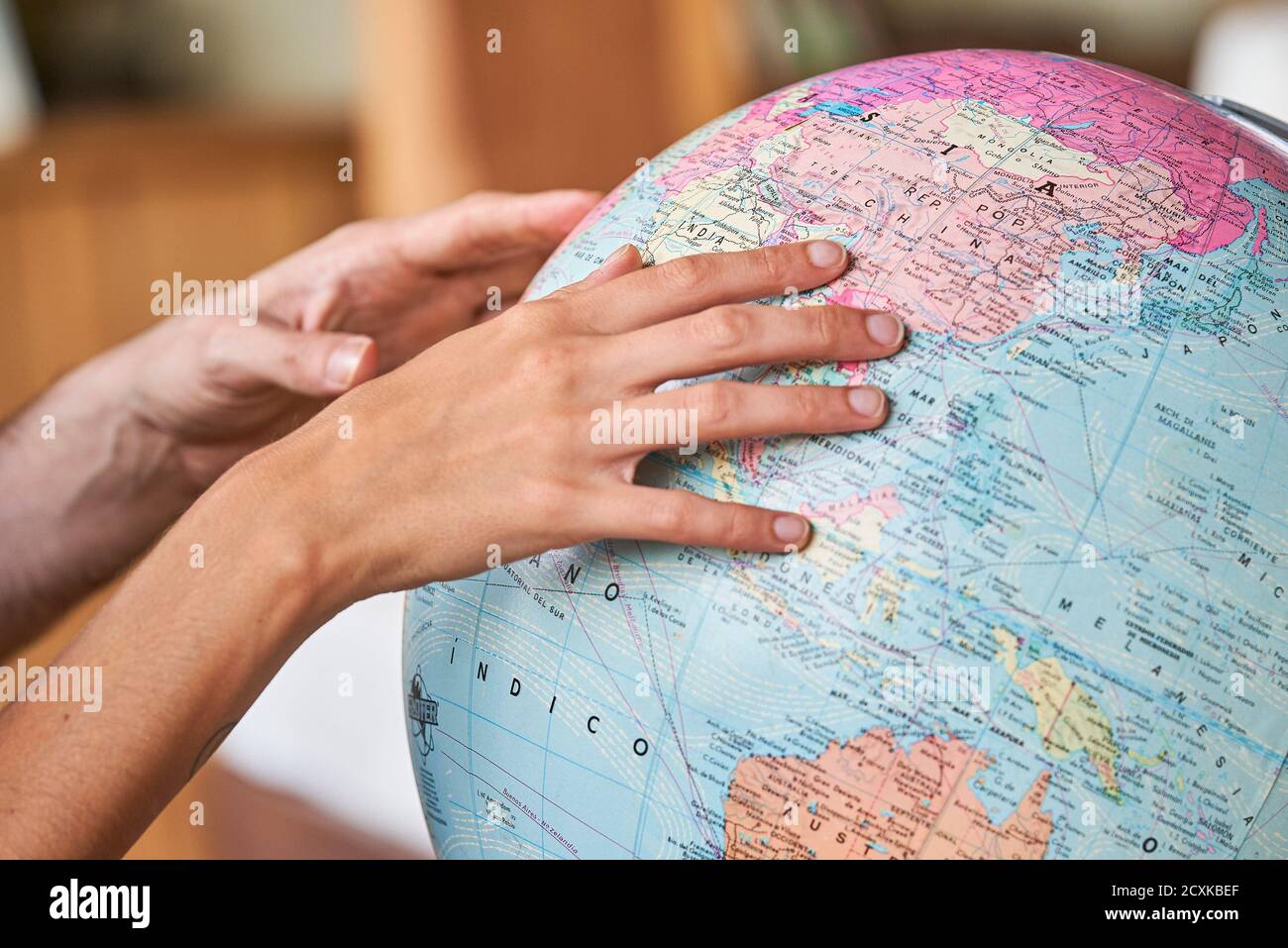 Close up pointing on world globe hi-res stock photography and images ...