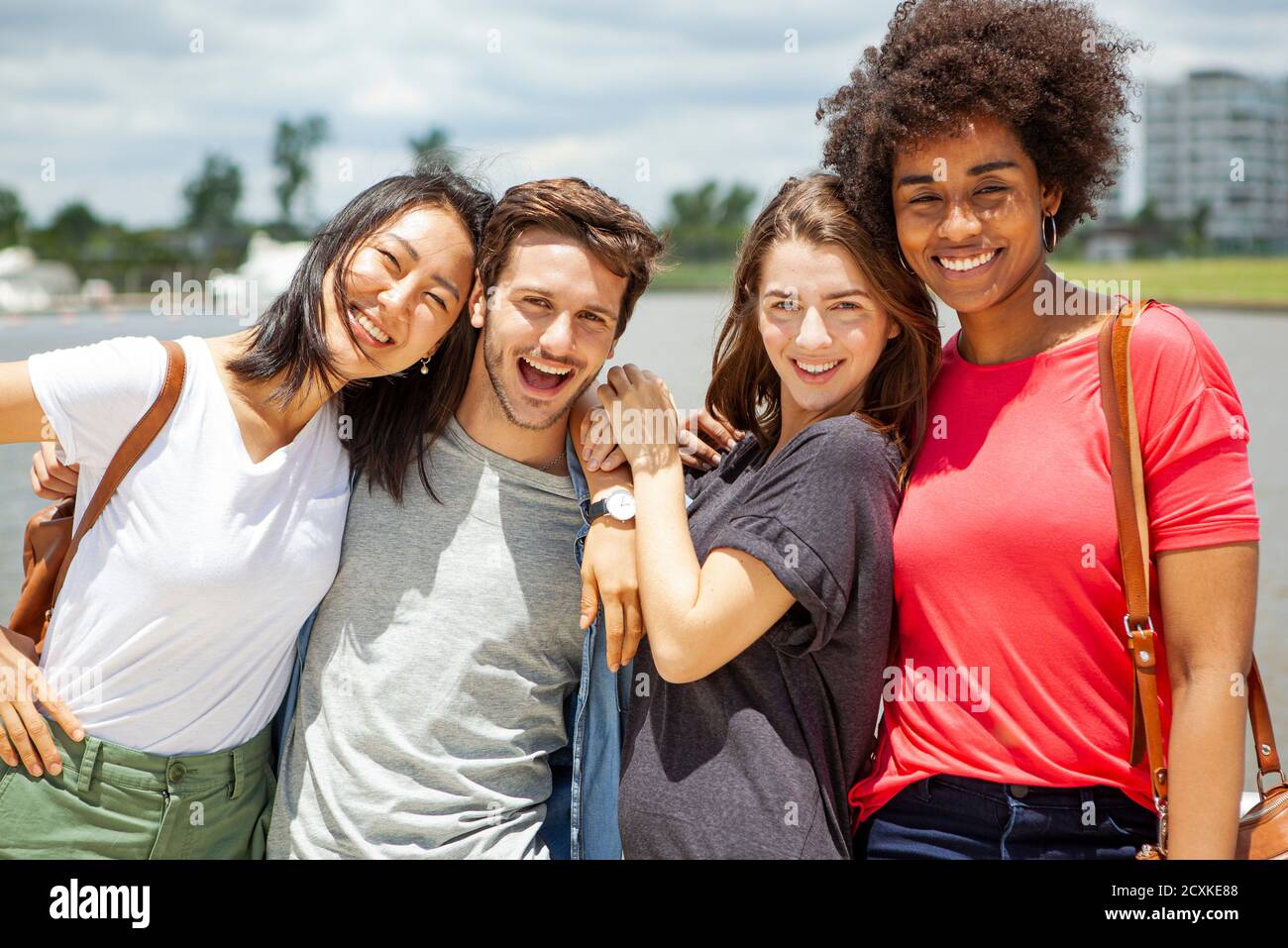 Group of young friends having fun outdoors Stock Photo - Alamy