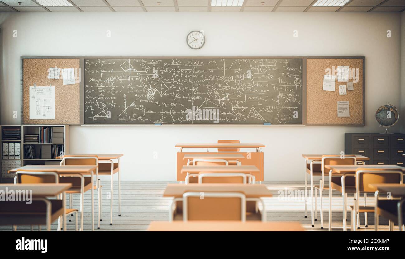 interior of a classroom with wooden desks and chairs, selective focus ...