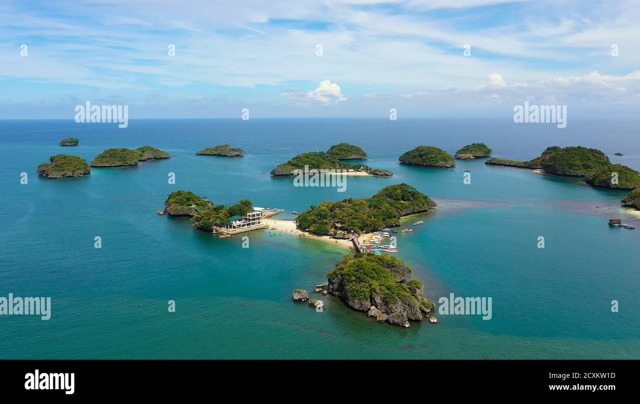 Aerial view of Small islands with beaches and lagoons in Hundred Islands National Park ...