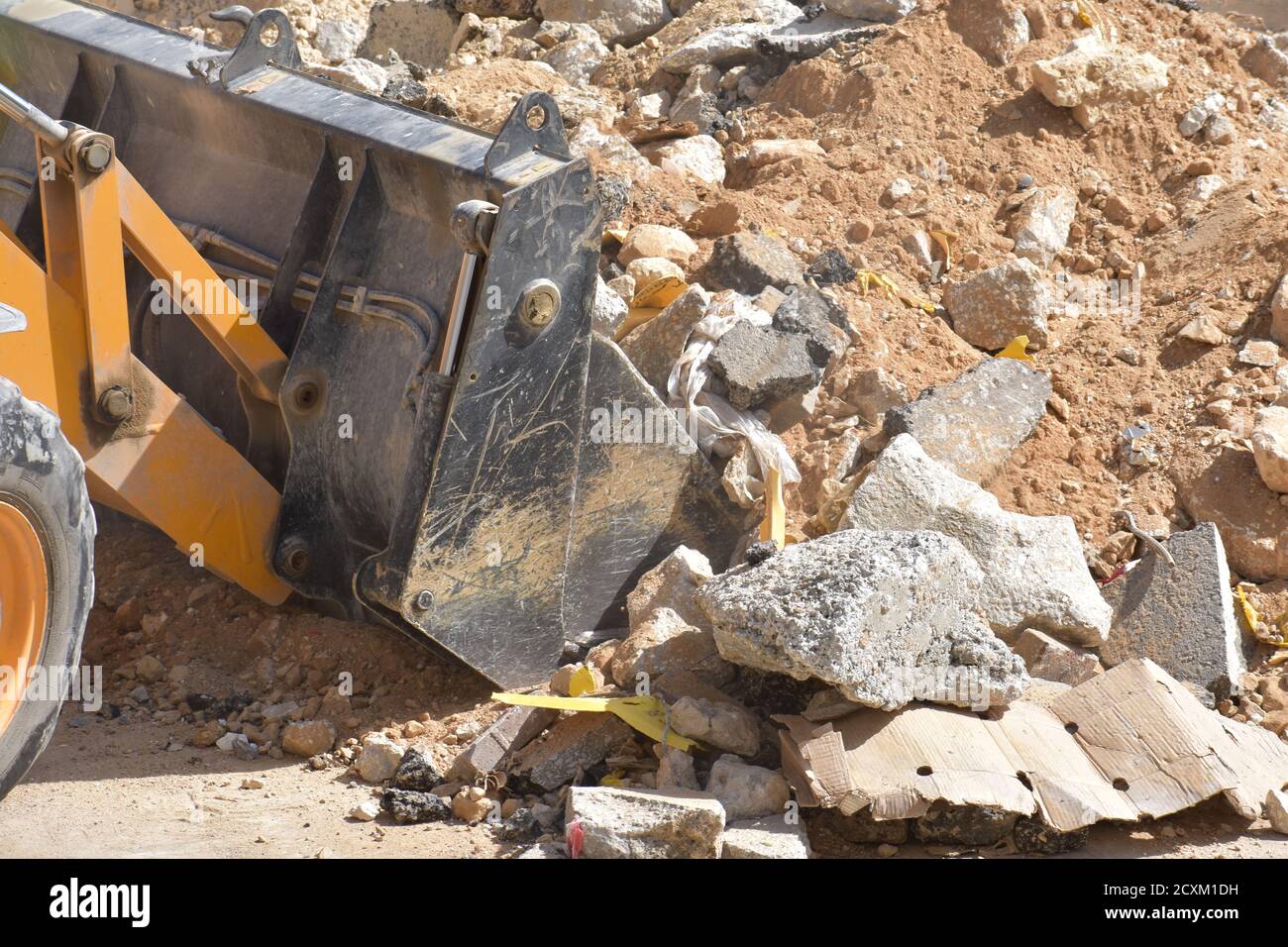 Digger Clearing Debris Stock Photo - Alamy