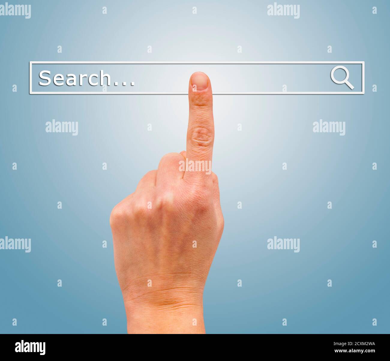 The index finger of a female hand points to the search field Stock ...