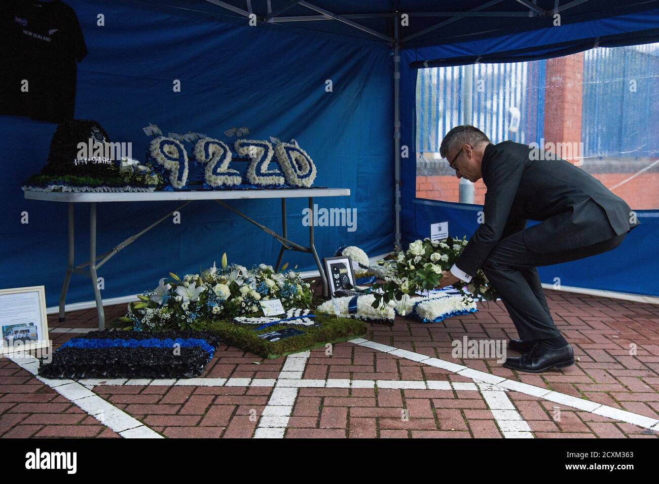 New Zealand High Commissioner to London Bede Corry lays a wreath for ...