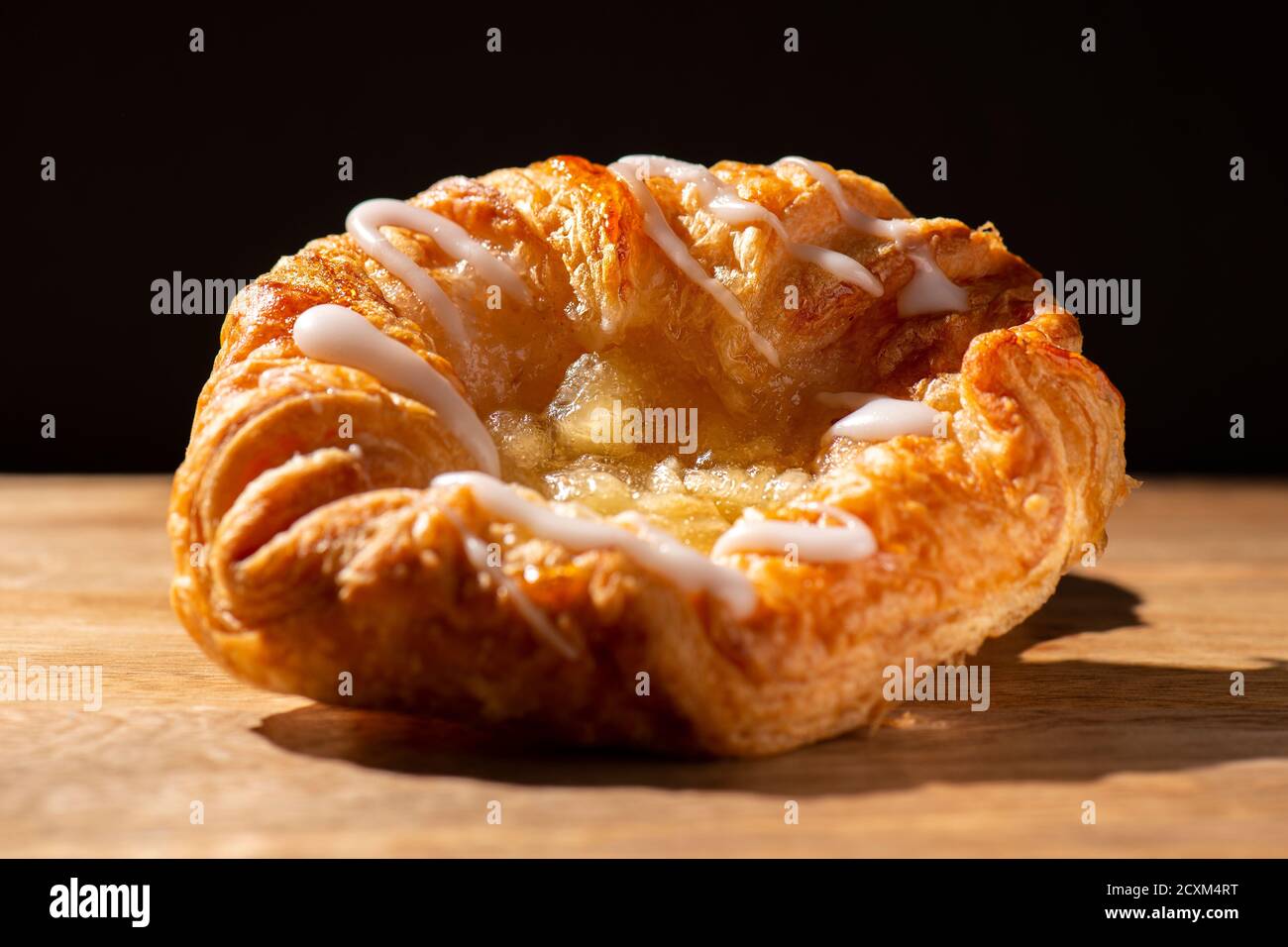 Detailed closeup macro photo of an Apple Danish Pastry, food background ...