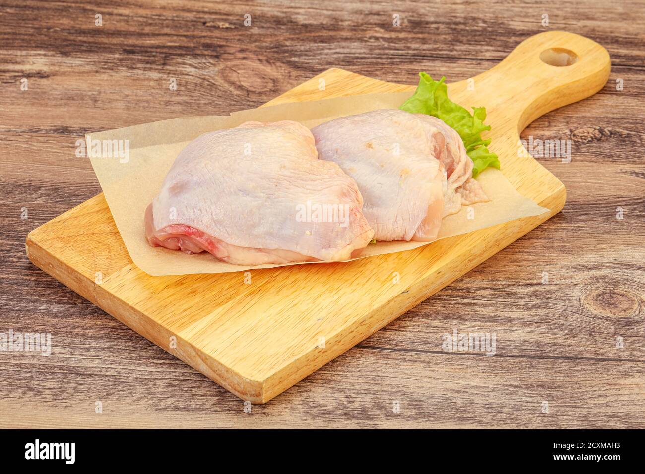 Raw chicken hip ready for cooking Stock Photo - Alamy