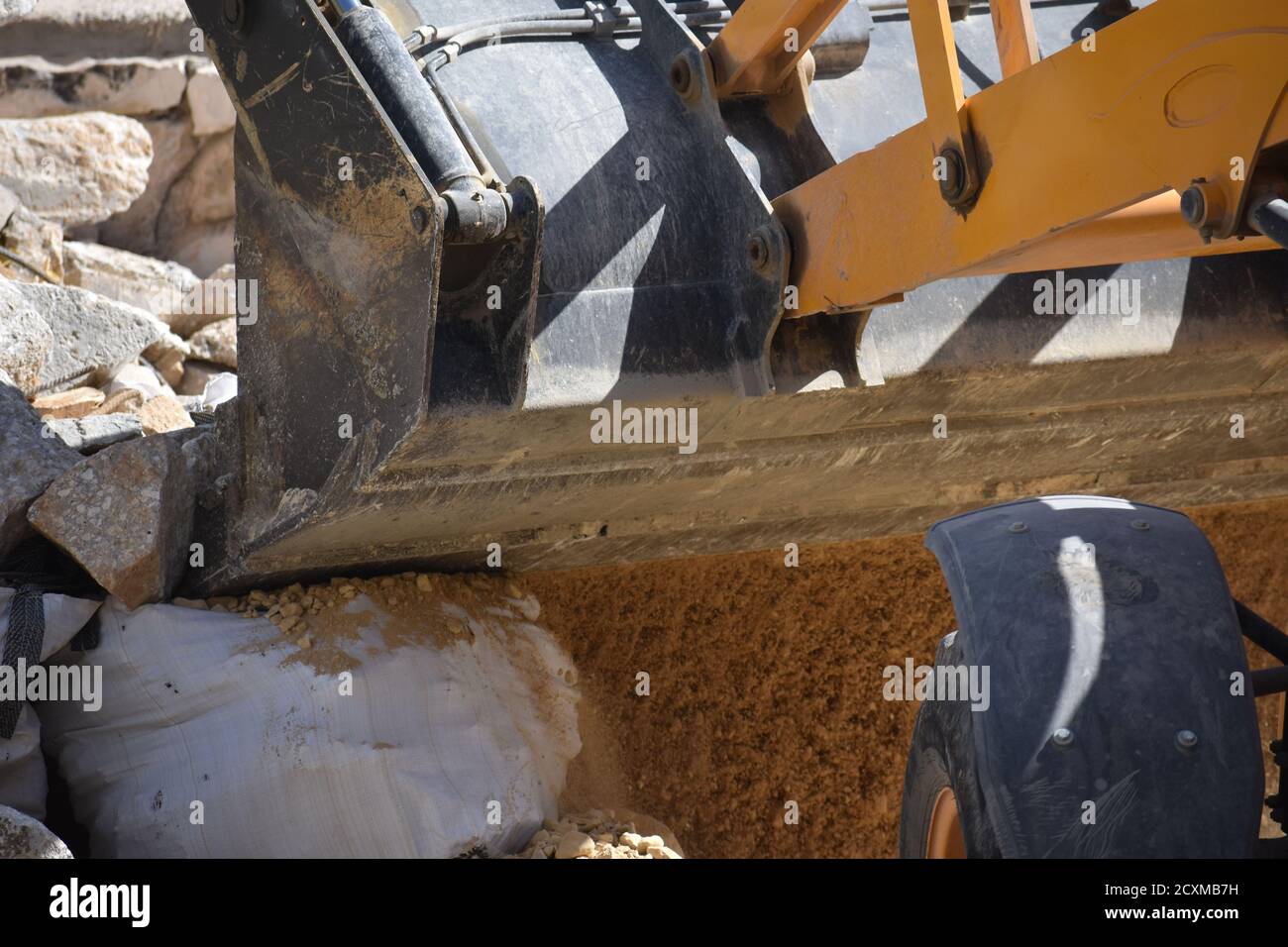 Digger Bucket Loading Debris Stock Photo - Alamy