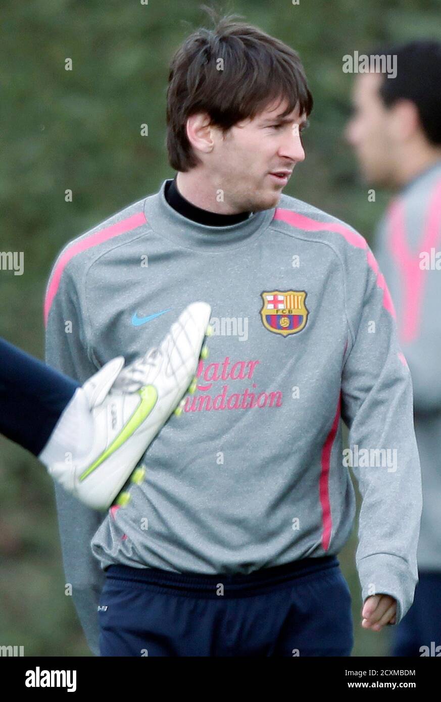 Barcelonas lionel messi attends training hi-res stock photography and ...