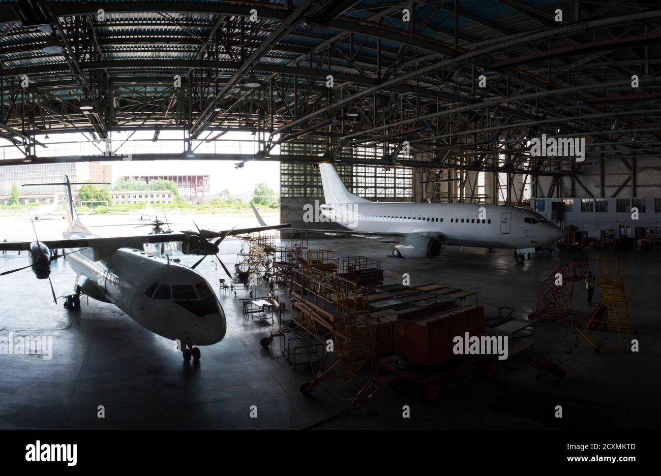 Repair and maintenance of passenger airplanes in the aviation hangar ...