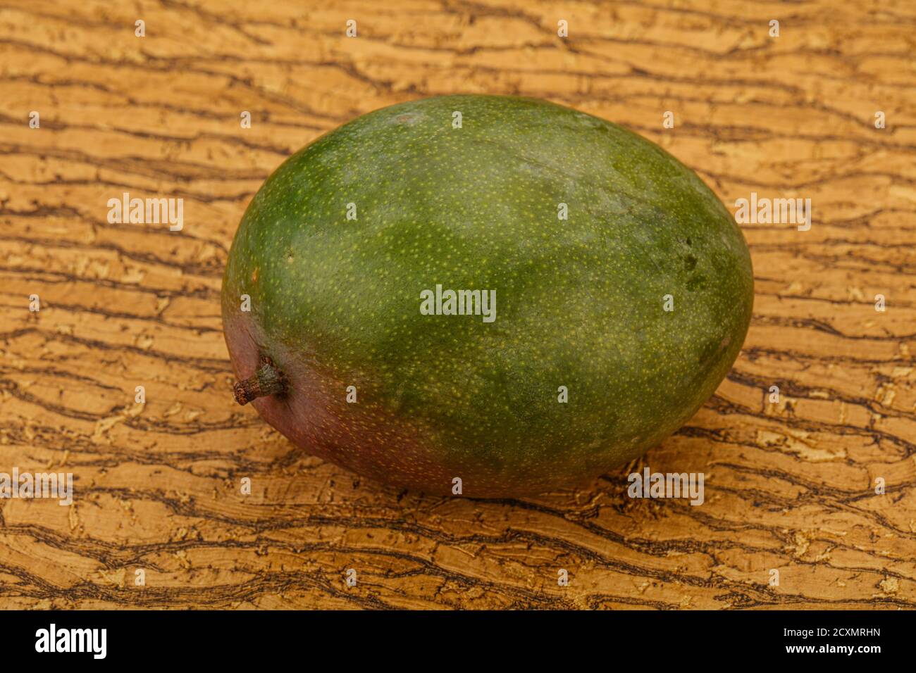 Tropical fruit - Green sweet tasty mango Stock Photo - Alamy