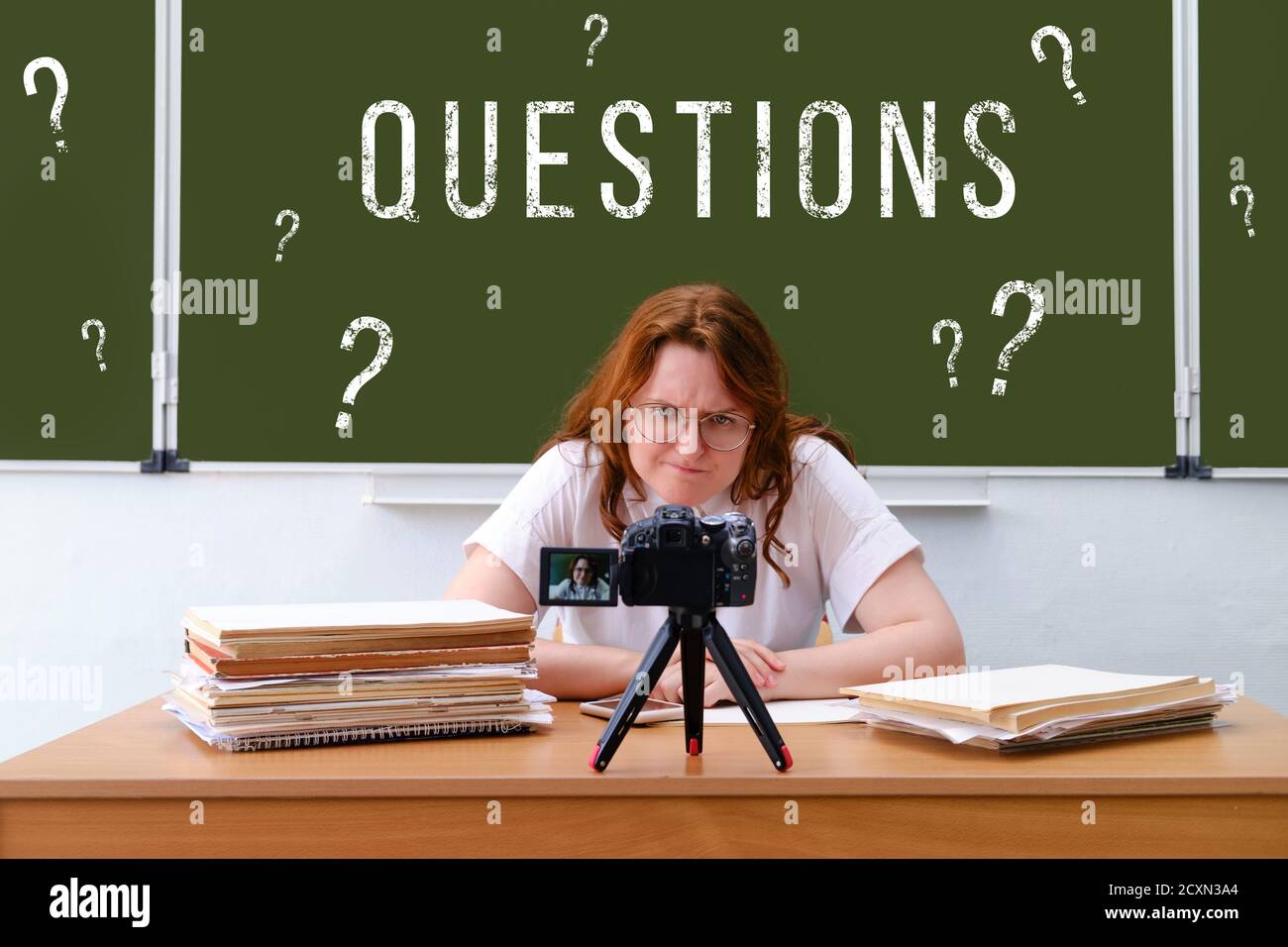 A school teacher looks at the camera and gets angry about problems with ...