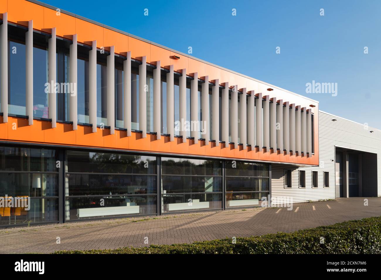 orange facade of a modern office building in the netherlands Stock ...
