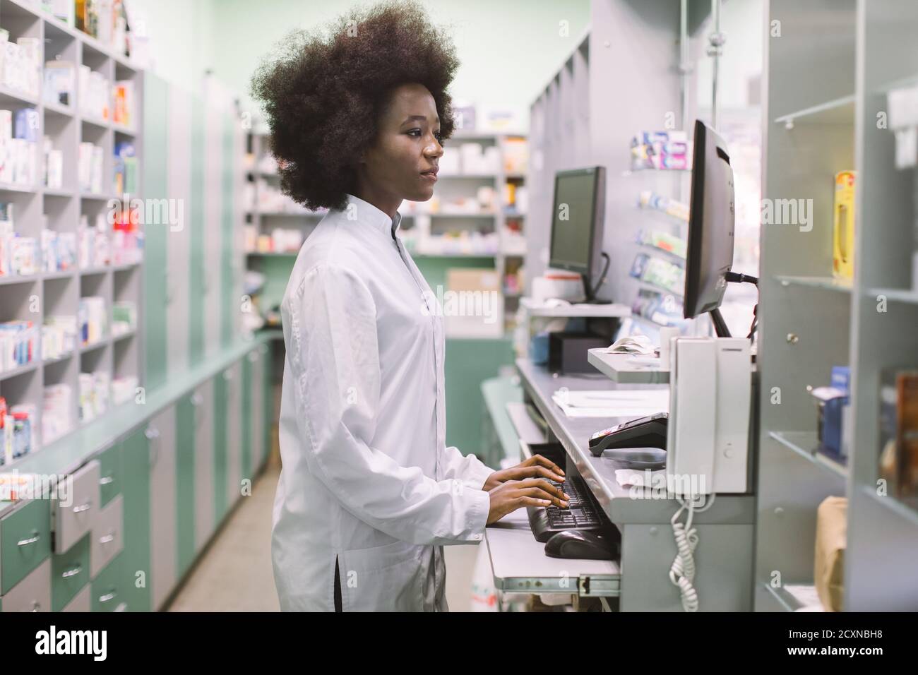 Side view portrait of young confident concentrated African female ...