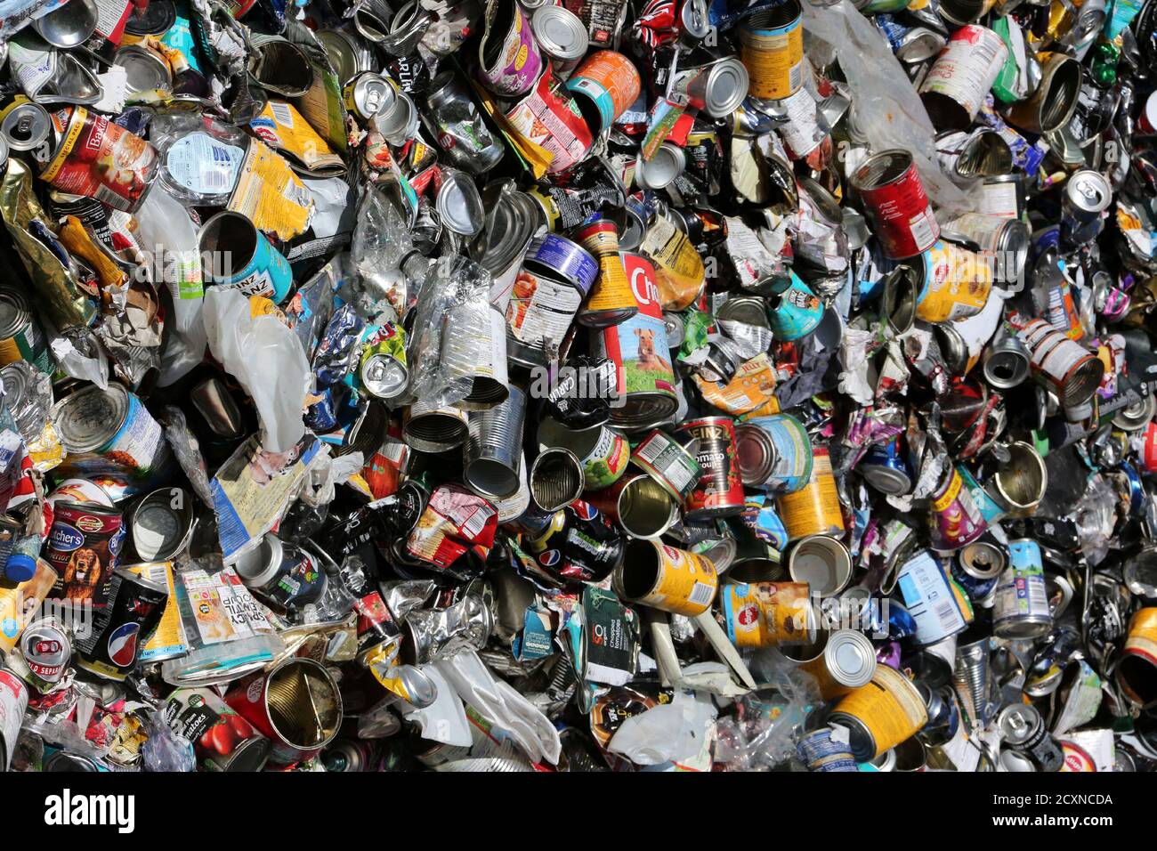 Different piles & stacks of various material being recycled ...