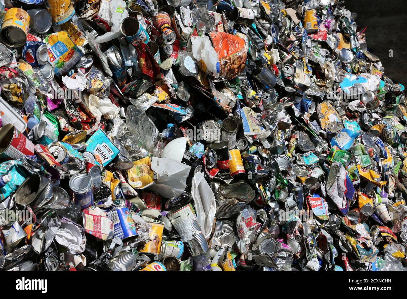 Different piles & stacks of various material being recycled ...