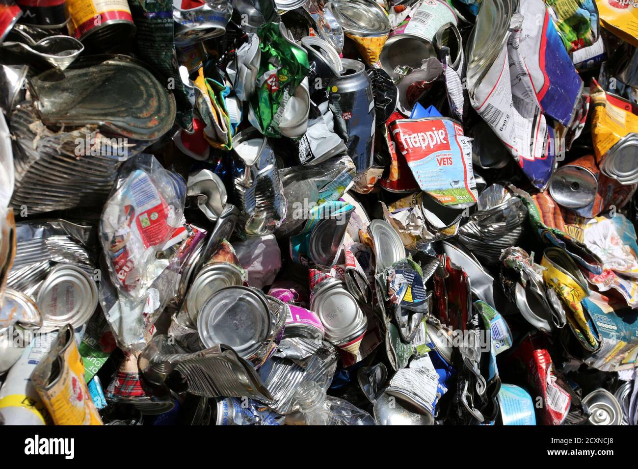 Different piles & stacks of various material being recycled ...