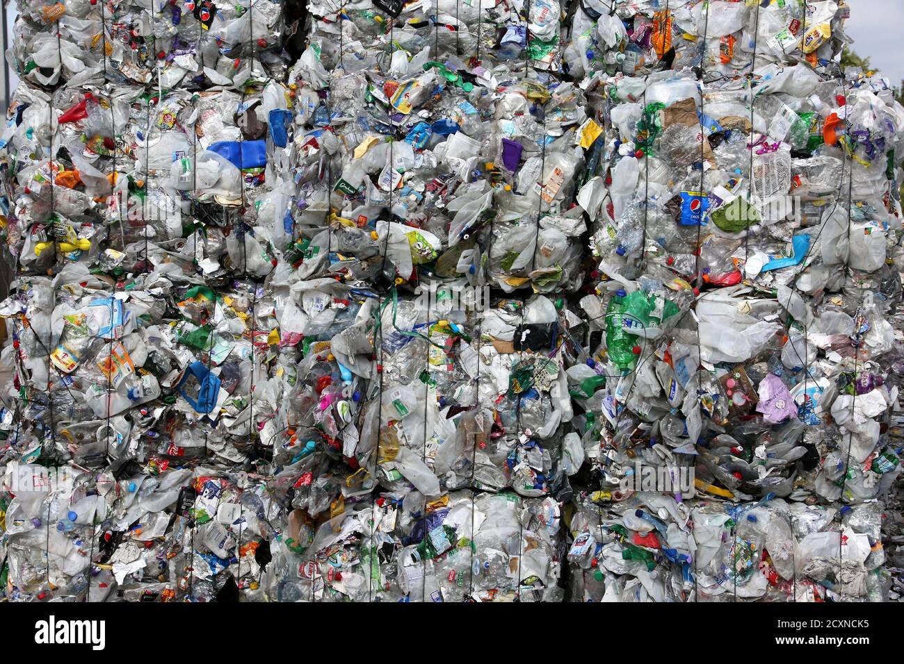 Different piles & stacks of various material being recycled ...