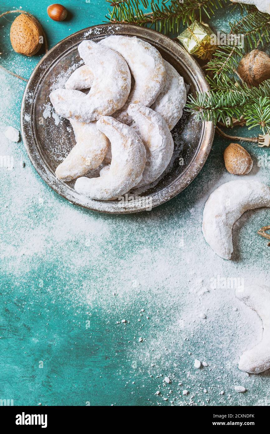 Homemade Christmas nuts cookies crescent with sugar powder in holiday ...