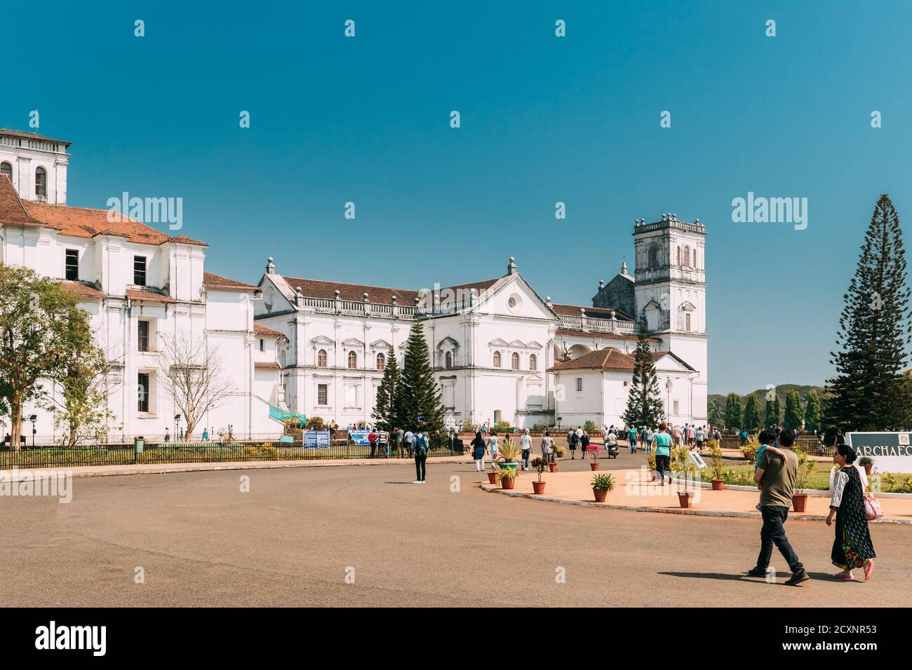 Old Goa, India. People Tourists Walking Near Catholic Church Of St ...