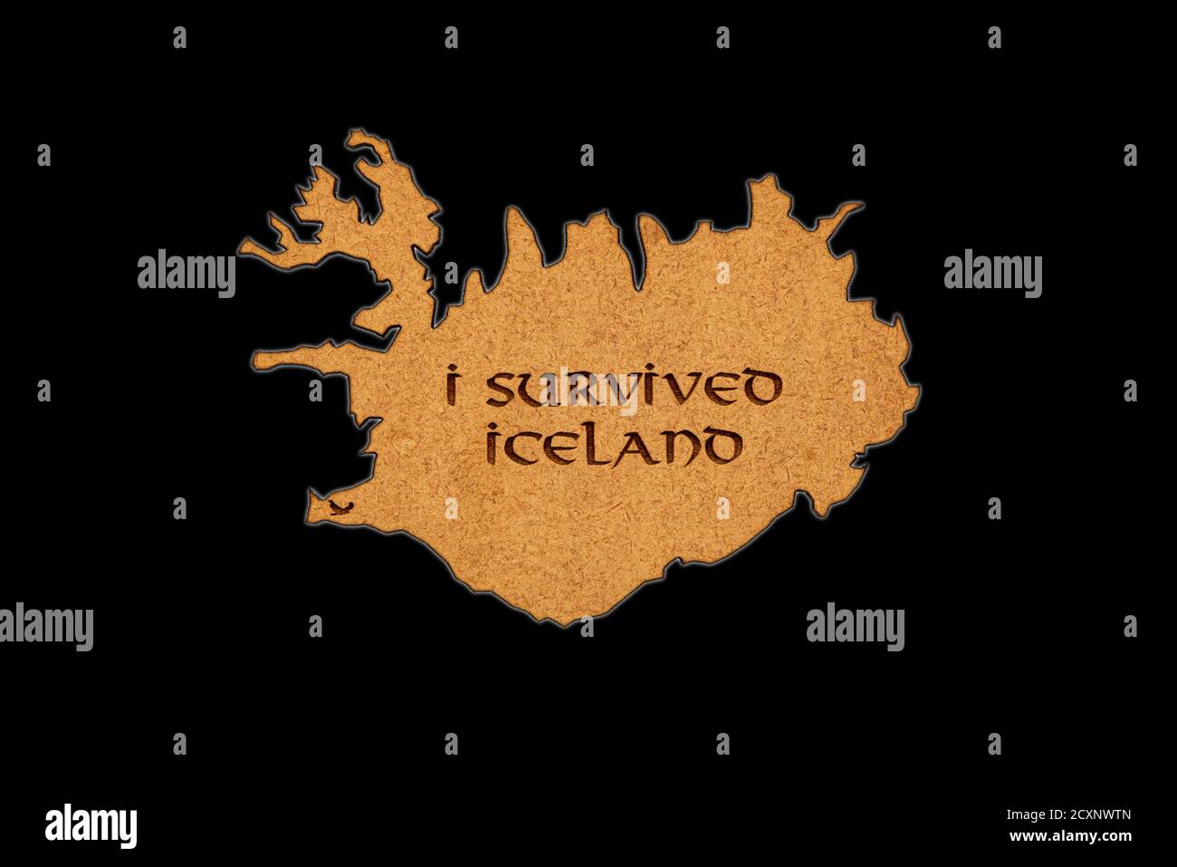 Map of Iceland on wood texture with the engraved inscription "I ...