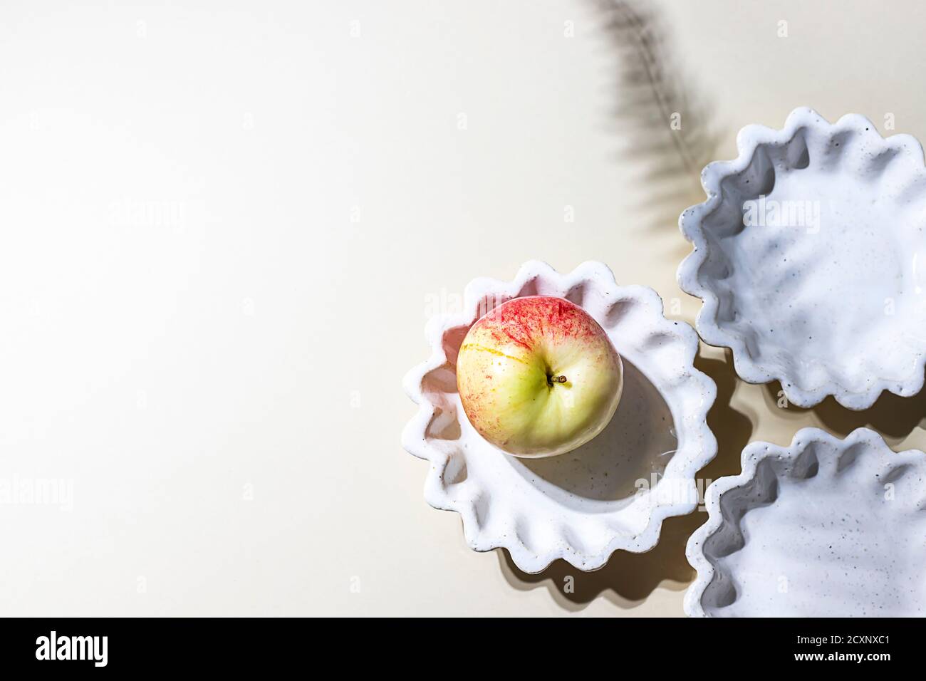 Ceramic handmade products. Concept homemade fall baking with apple ...